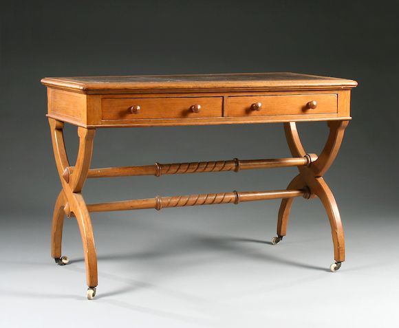 Bonhams : A mid Victorian reformed Gothic oak writing table,