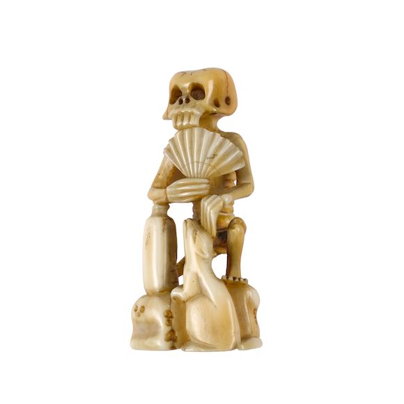Bonhams : A macabre ivory netsuke designed as a skeleton with a fan ...