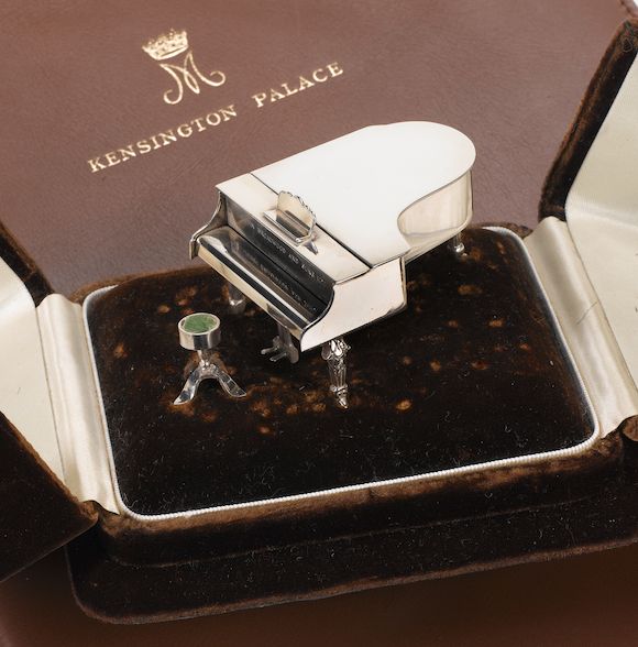 Bonhams : A silver Reuge musical box, in the form of a grand piano and ...