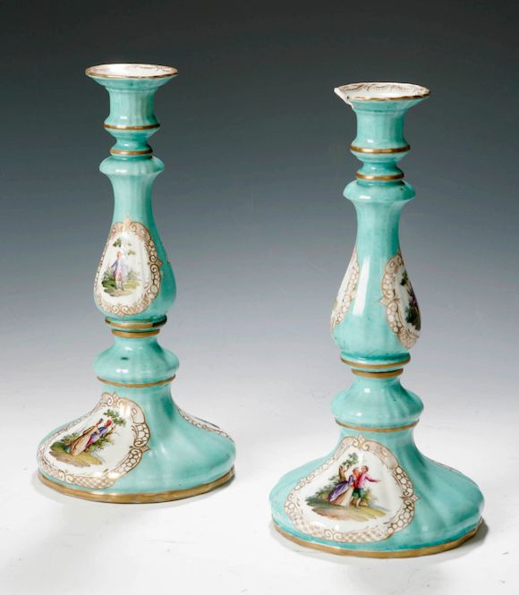 Bonhams : A pair of Dresden blue ground porcelain candlesticks