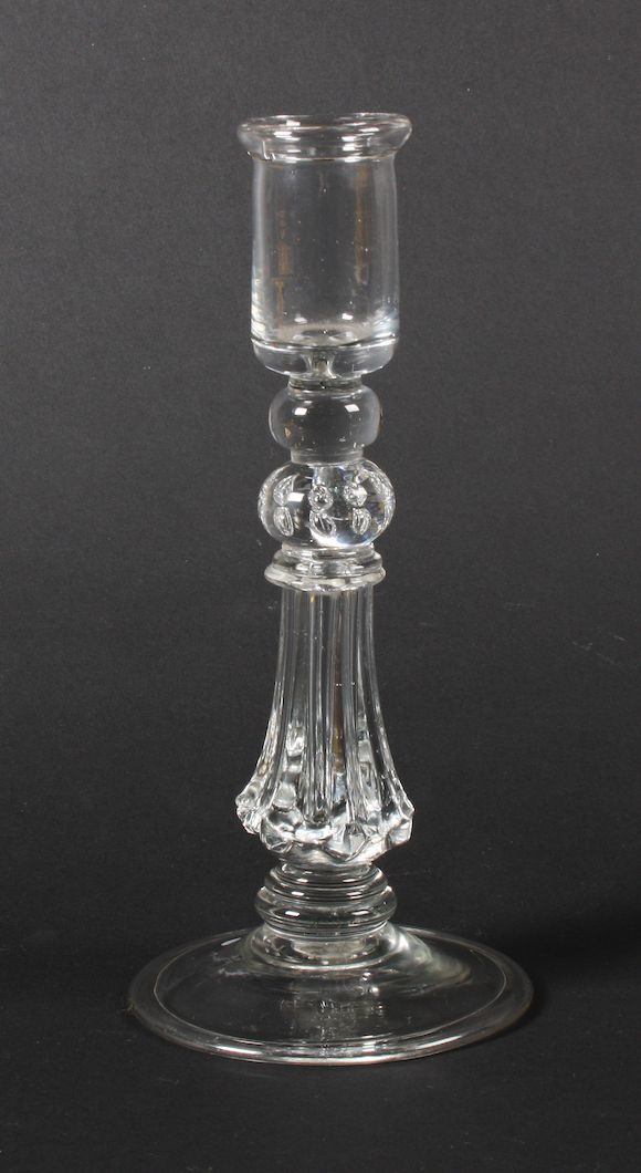 Bonhams : A pedestal-stem candlestick Circa 1740