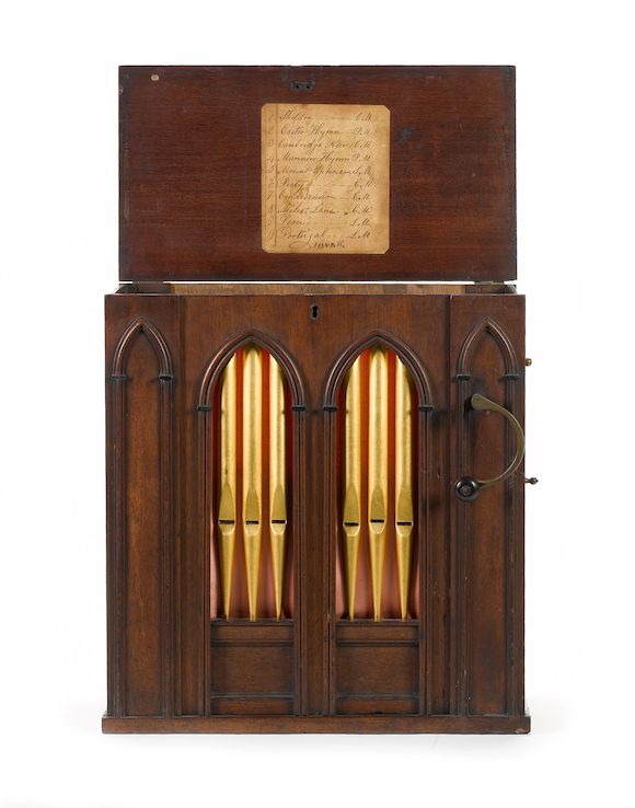Bonhams : A small fourteen-key barrel organ,