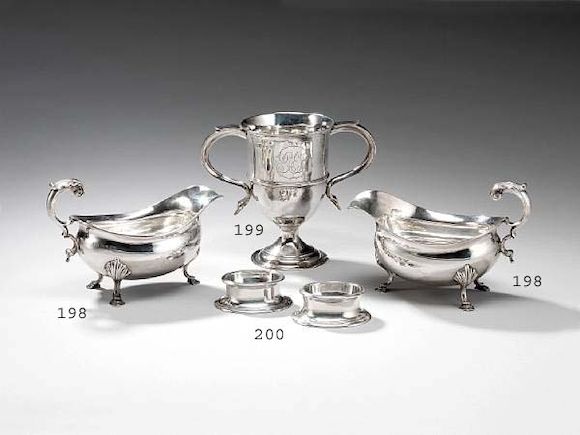 Bonhams : A matched pair of Queen Anne/George I Scottish silver ...