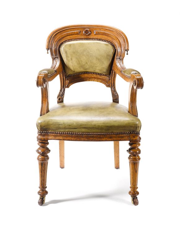 Bonhams : A Victorian carved oak Gothic Revival Library Open Armchair ...