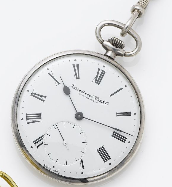 Bonhams : IWC. A silver open face pocket watch together with a metal chain