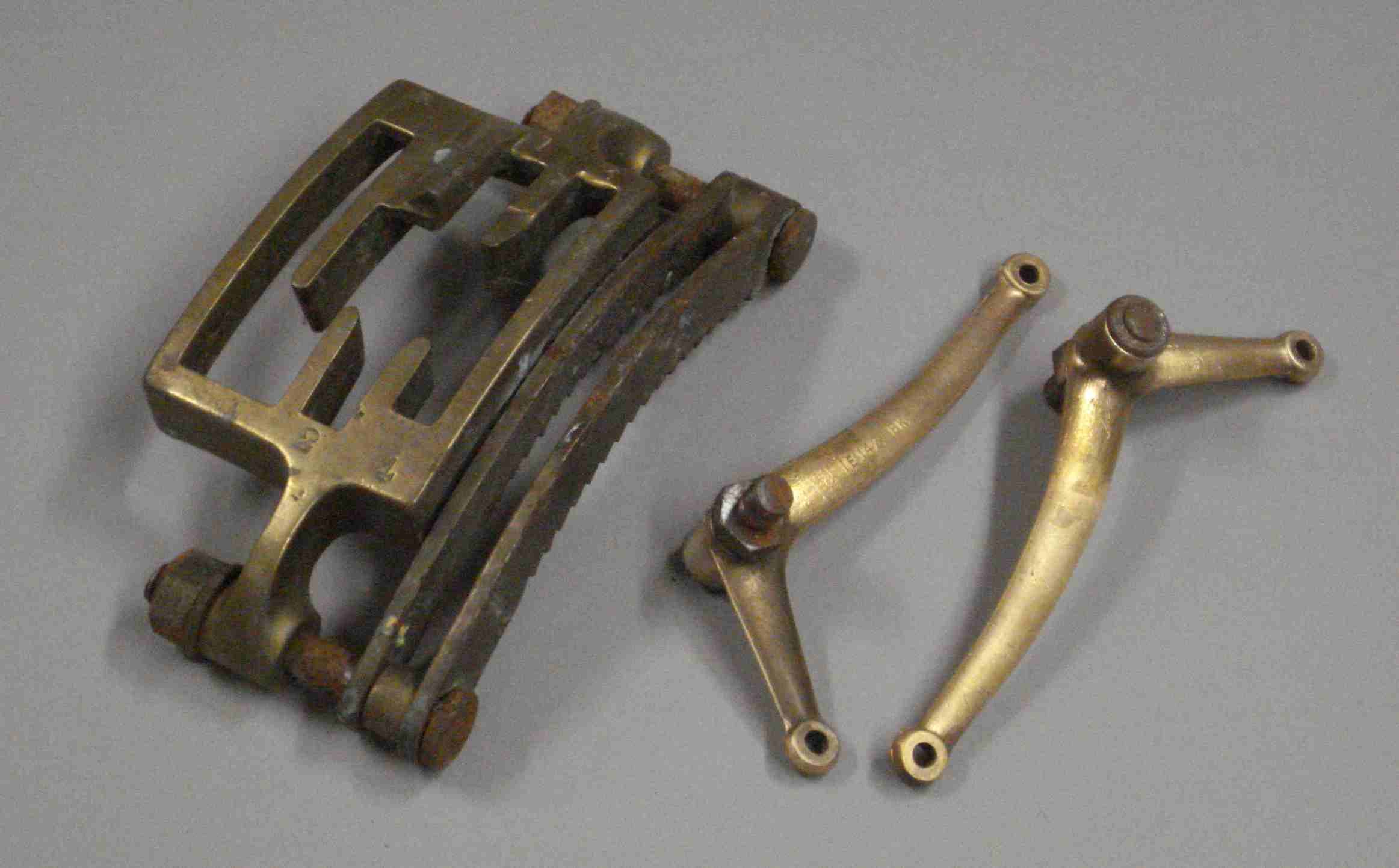 Bonhams Cars : A gear gate and handbrake ratchet unit,