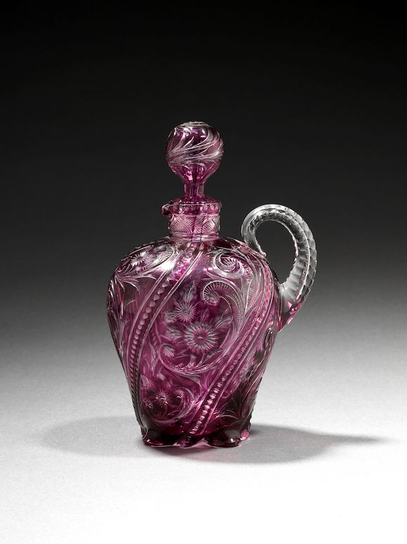 Bonhams : A Stevens and Williams engraved amethyst-cased whisky pitcher ...