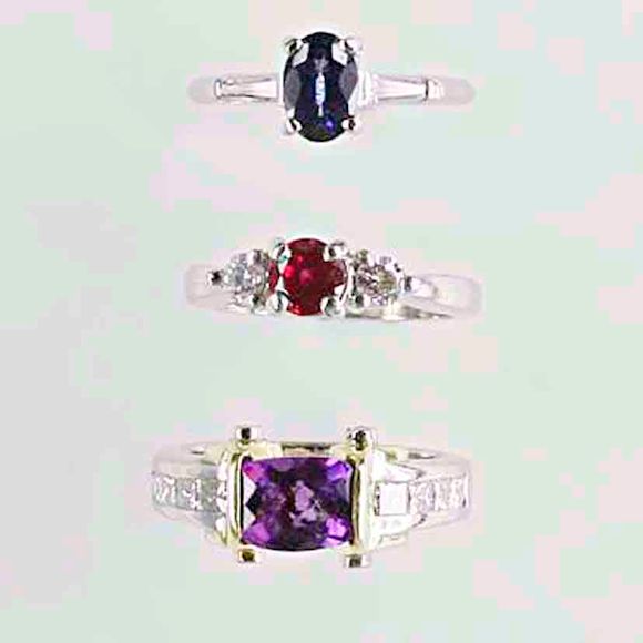 Bonhams : Three gem set rings (3)