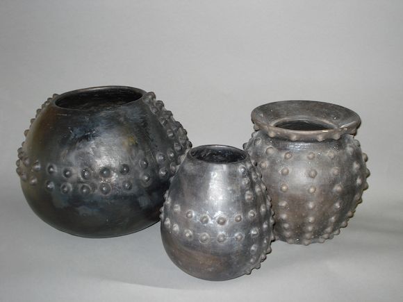 Bonhams : Three Fesi pottery vases, Kpando, Ghana 24, 21 and 18.5cm tall. 3