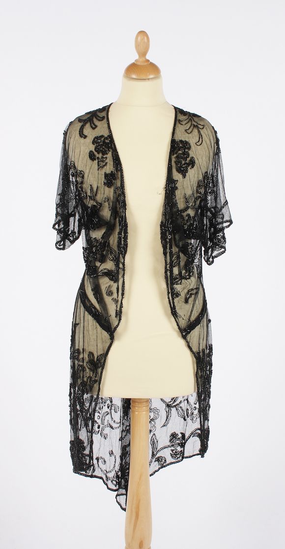 Bonhams : A black beaded open dress rope