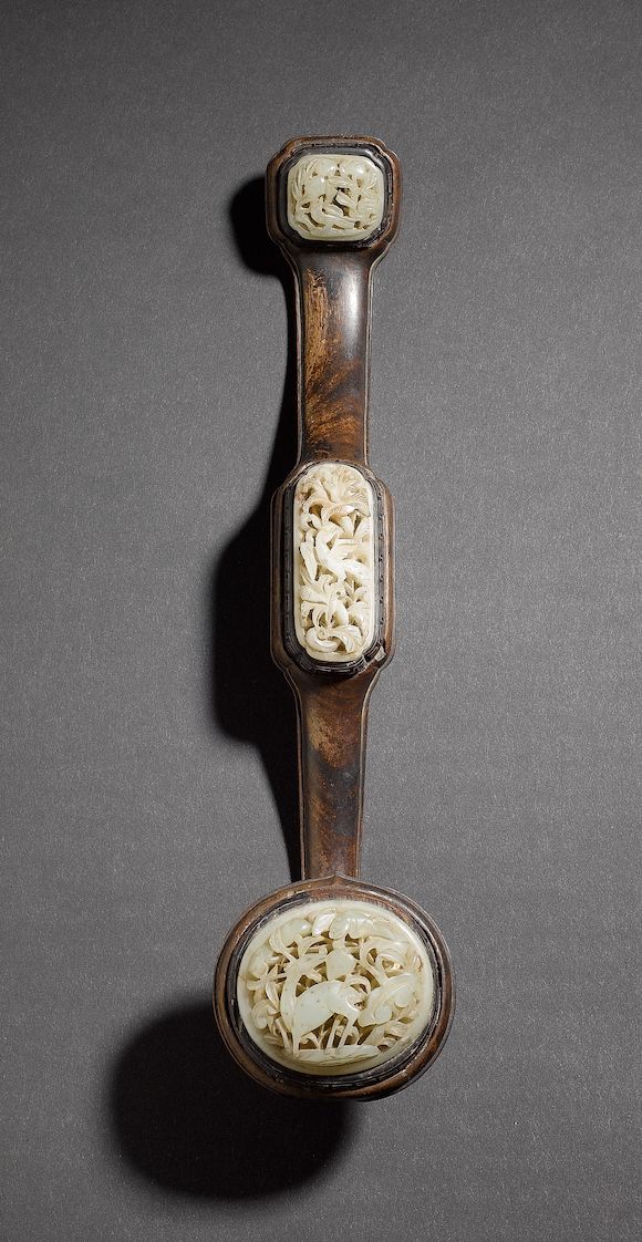 Bonhams : A green jade mounted sceptre of typical stellar/cosmological form