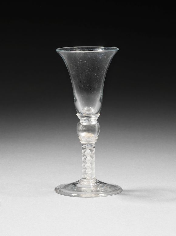 Bonhams : A rare opaque-twist coin goblet Circa 1765.