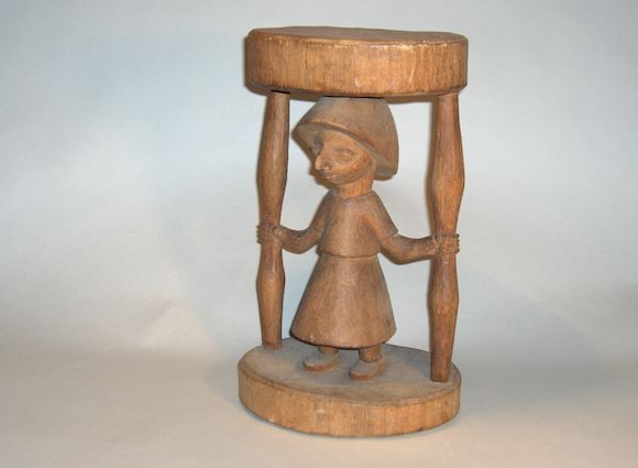 Bonhams : A Nigerian figural stool School of Thomas Ona Odulate 39cm high