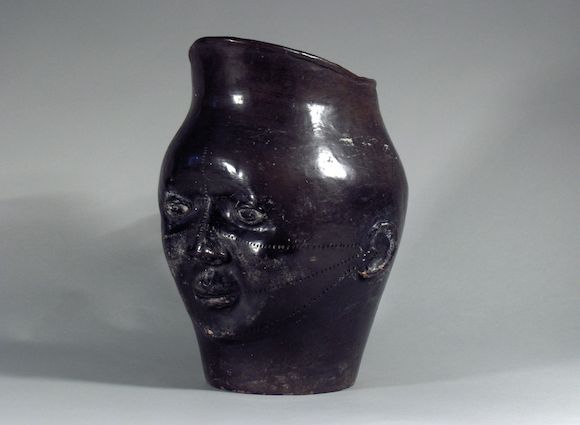 Bonhams : A Mpondo pottery cephalomorphic jug, South Africa, damages
