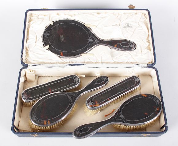 Bonhams : A five piece silver and tortoiseshell dressing table set By ...