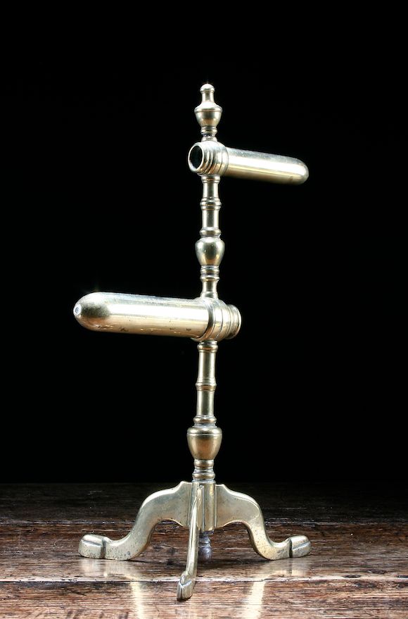 Bonhams : An early 19th Century brass double goffering-iron stand
