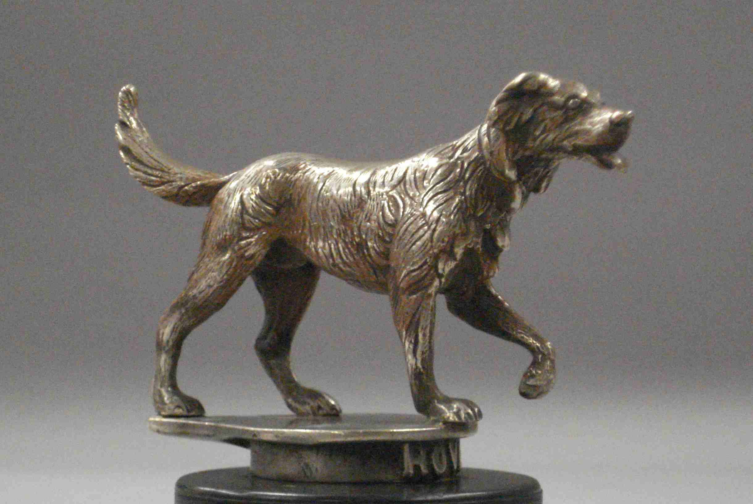 Bonhams Cars : A Red Setter mascot, for Rover Cars, 1920s,
