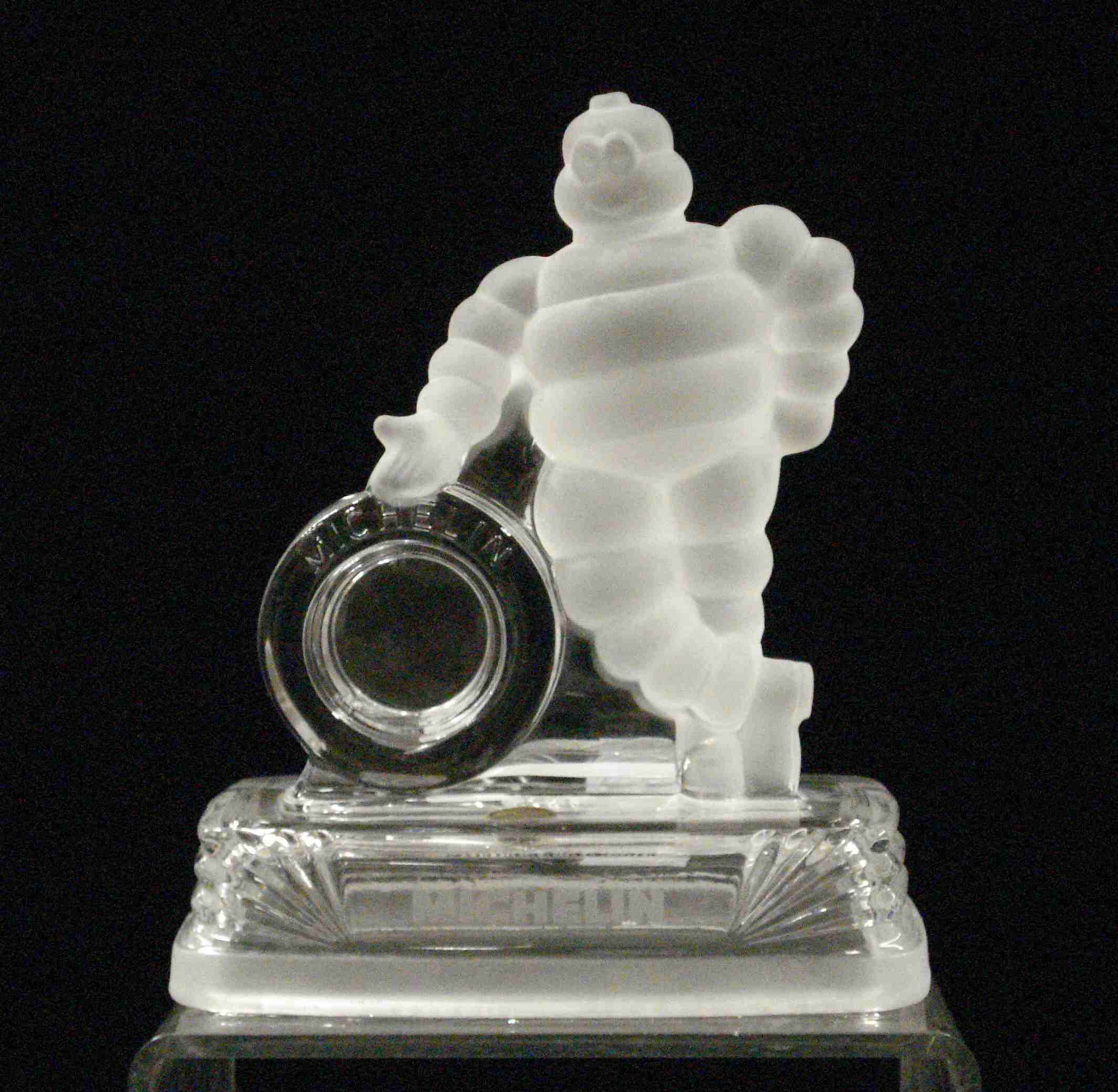 Bonhams Cars : A Michelin Bibendum glass desk piece by Crystal d'Arques,