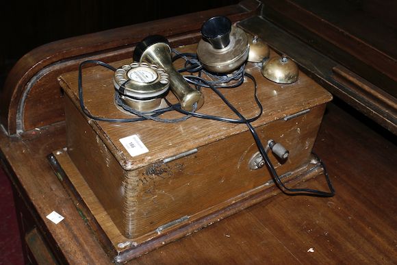 Bonhams : An early 20th century Canadian oak and brass telephone.