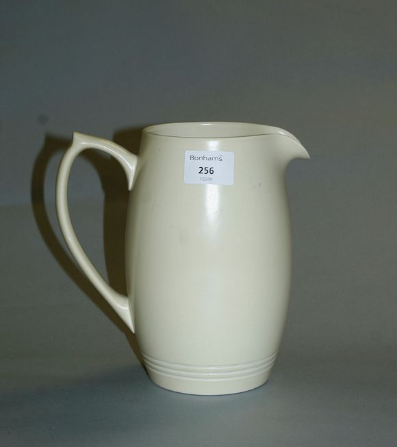 Bonhams : Keith Murray for Wedgwood: a cream glazed water jug