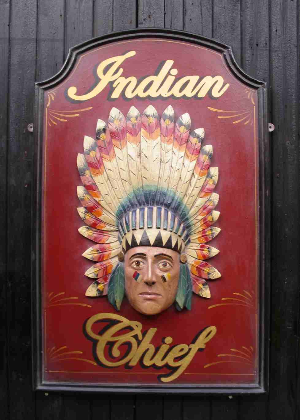 Bonhams Cars : A hand-painted Indian 'Chief' Motorcyles wooden sign,