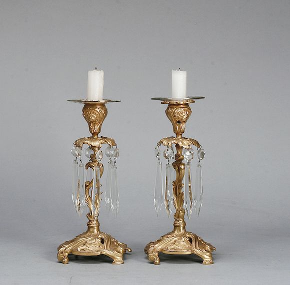Bonhams : A pair of French gilt brass candlesticks