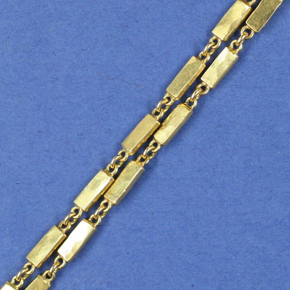 Bonhams : A yellow precious metal necklace