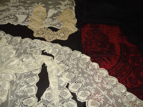 Bonhams : Two large black triangular shawl of machine made chantilly ...
