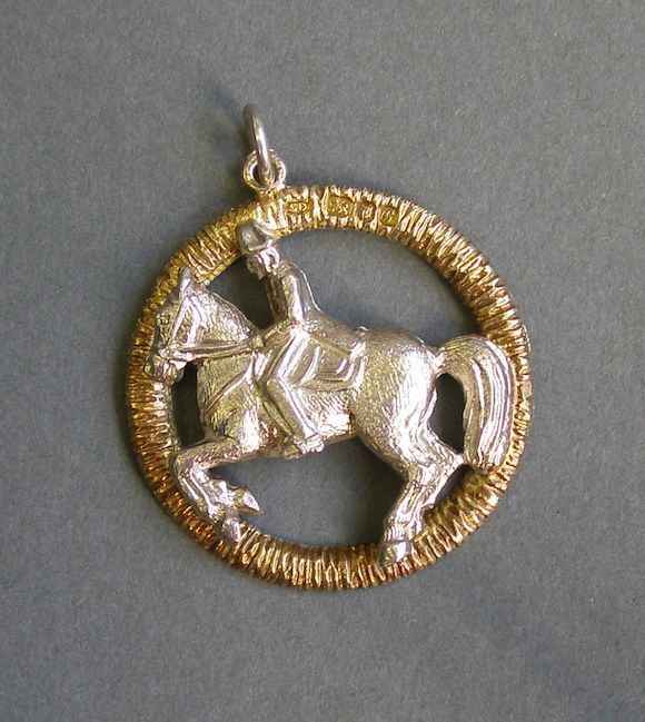 Bonhams : STUART DEVLIN A silver and silver-gilt horse riding pendant ...