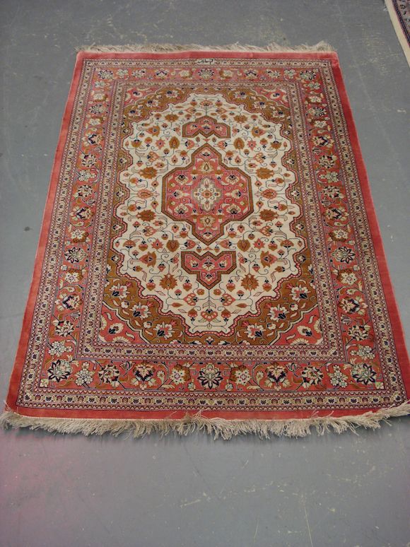 Bonhams : A silk Ghom rug Central Persia, 113cm x 76cm