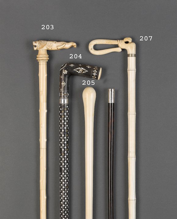 Bonhams : A Victorian silver-mounted tortoiseshell baton, unmarked,