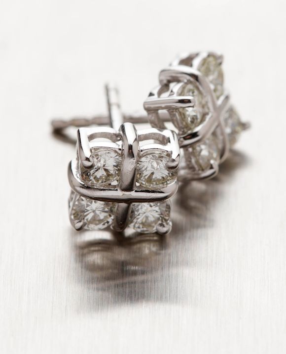 Bonhams : A pair of diamond Saltire design earstuds