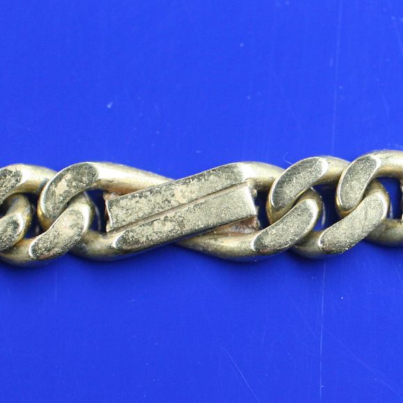 Bonhams : A flattened curb and baton-link necklace