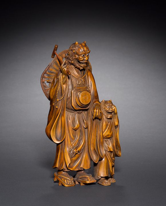 Bonhams : An amusing wood okimono of two Oni Meiji Period