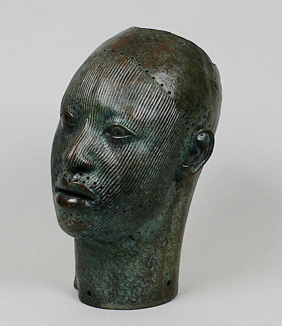 Bonhams : A bronze life size copy of a Benin head