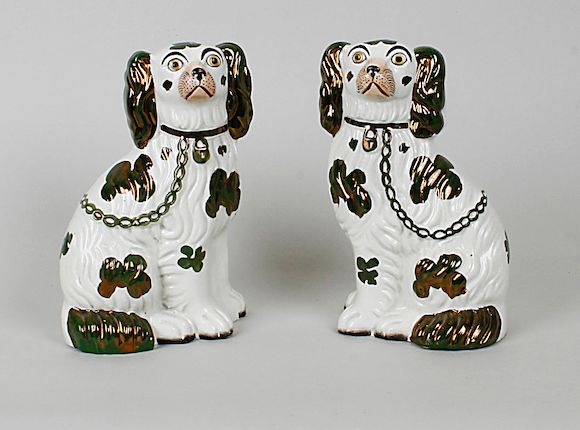 Bonhams : A pair of Staffordshire spaniel chimney dogs late 19th Century,