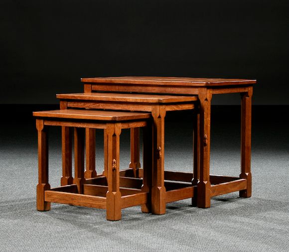 Bonhams : A nest of three light oak 'Mouseman' occasional tables