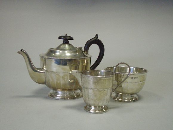 Bonhams : REGIMENTAL INTEREST A silver three-piece tea service, by ...