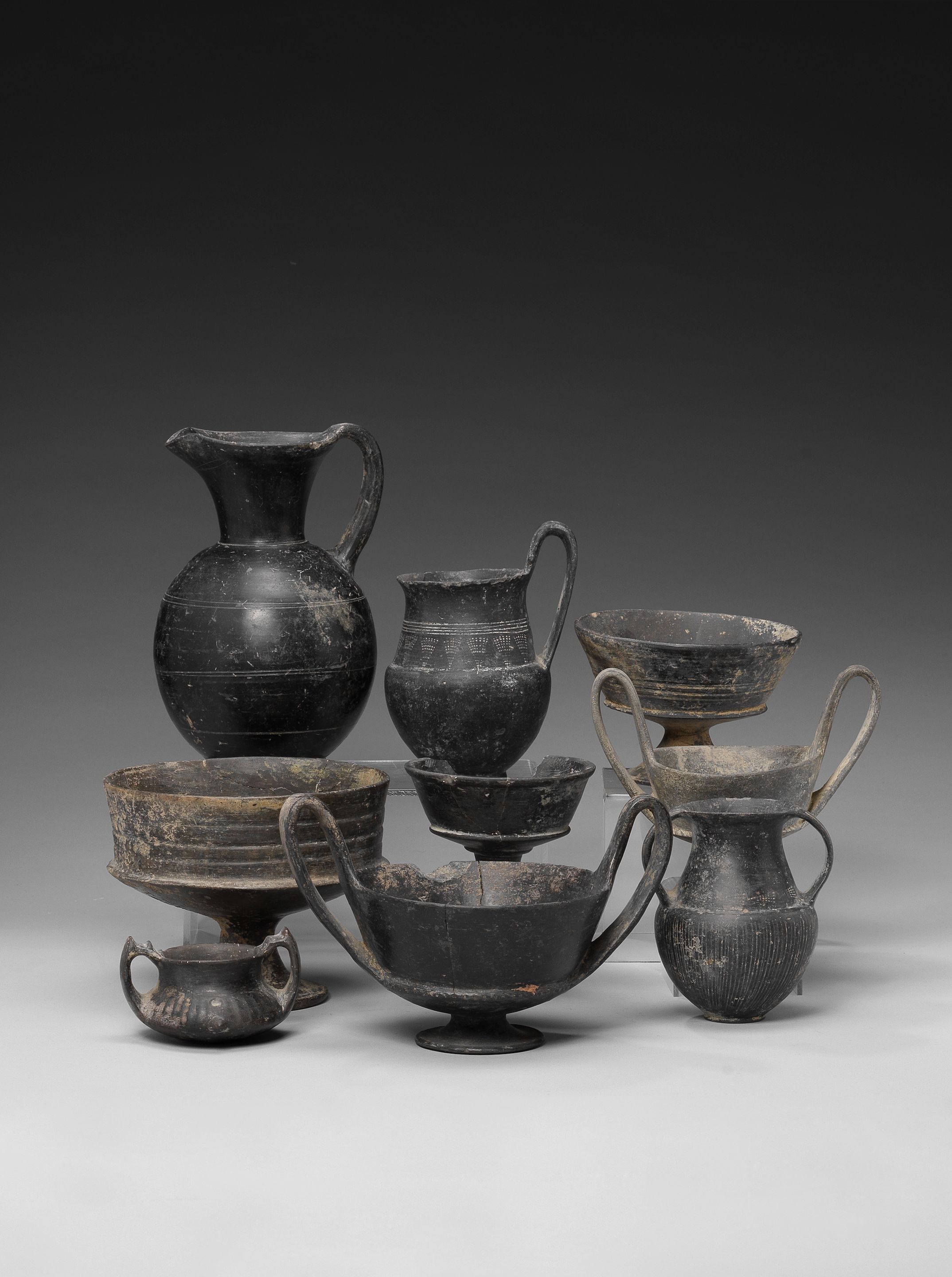 Nine Etruscan pottery vessels Circa - auctions & price archive