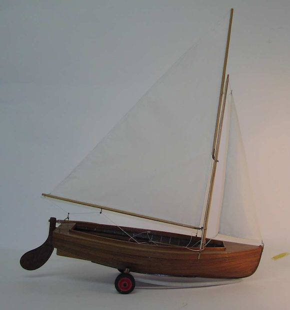 Bonhams : A model of a gunter rigged half deck sailing dinghy 25x8 ...
