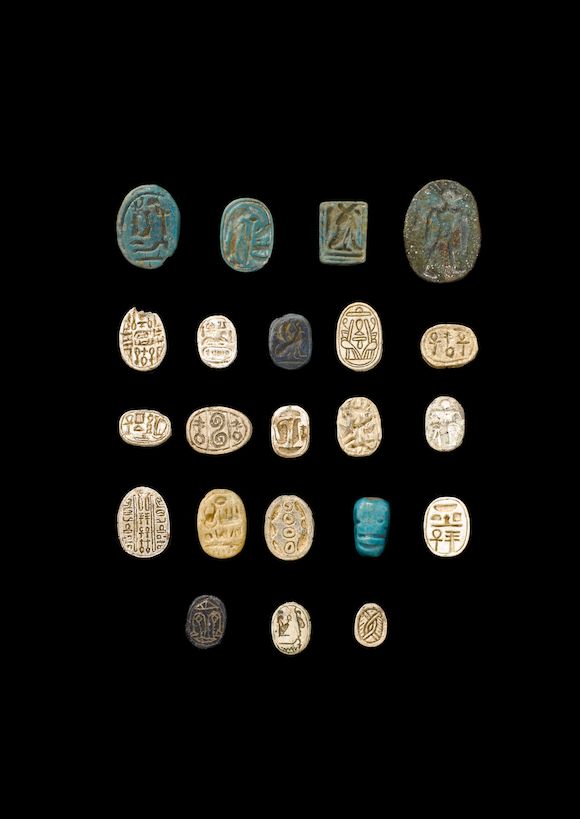 Bonhams : A group of nineteen Egyptian steatite, glazed composition and ...