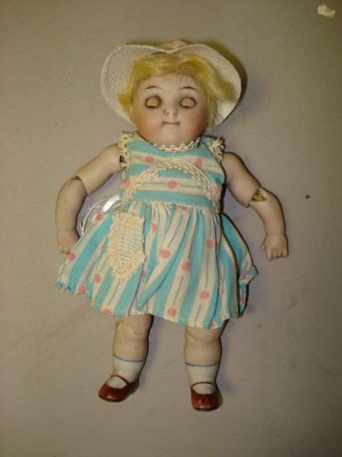 Bonhams : All-bisque jointed Googly doll, German circa 1910