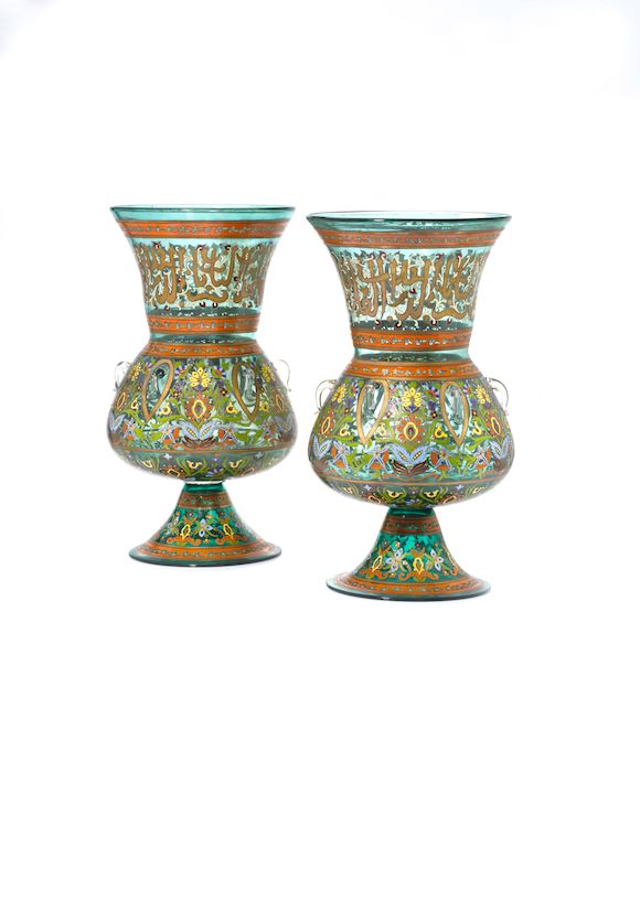Bonhams : A large pair of Islamic-style enamelled green-tinted glass ...