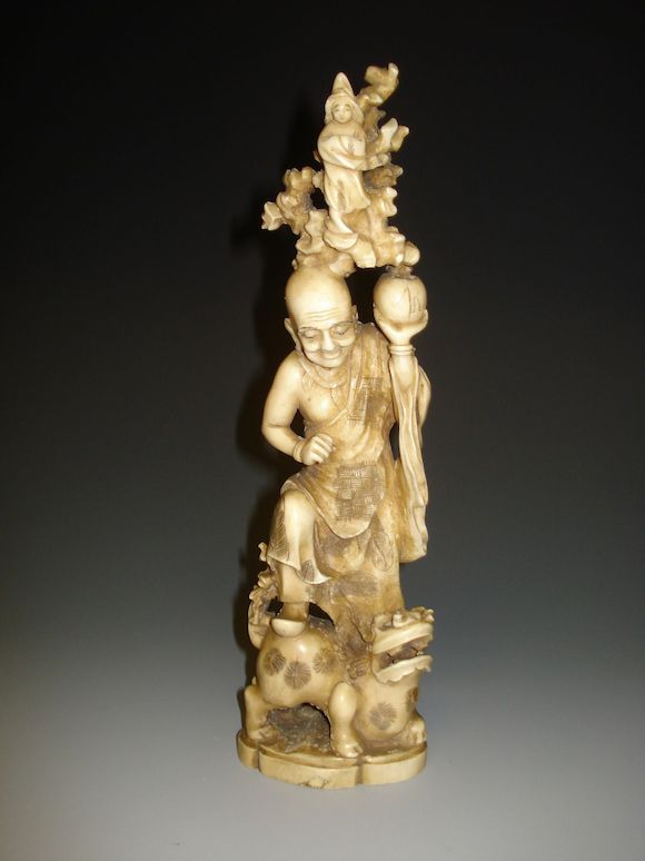 Bonhams : A Japanese carved ivory group