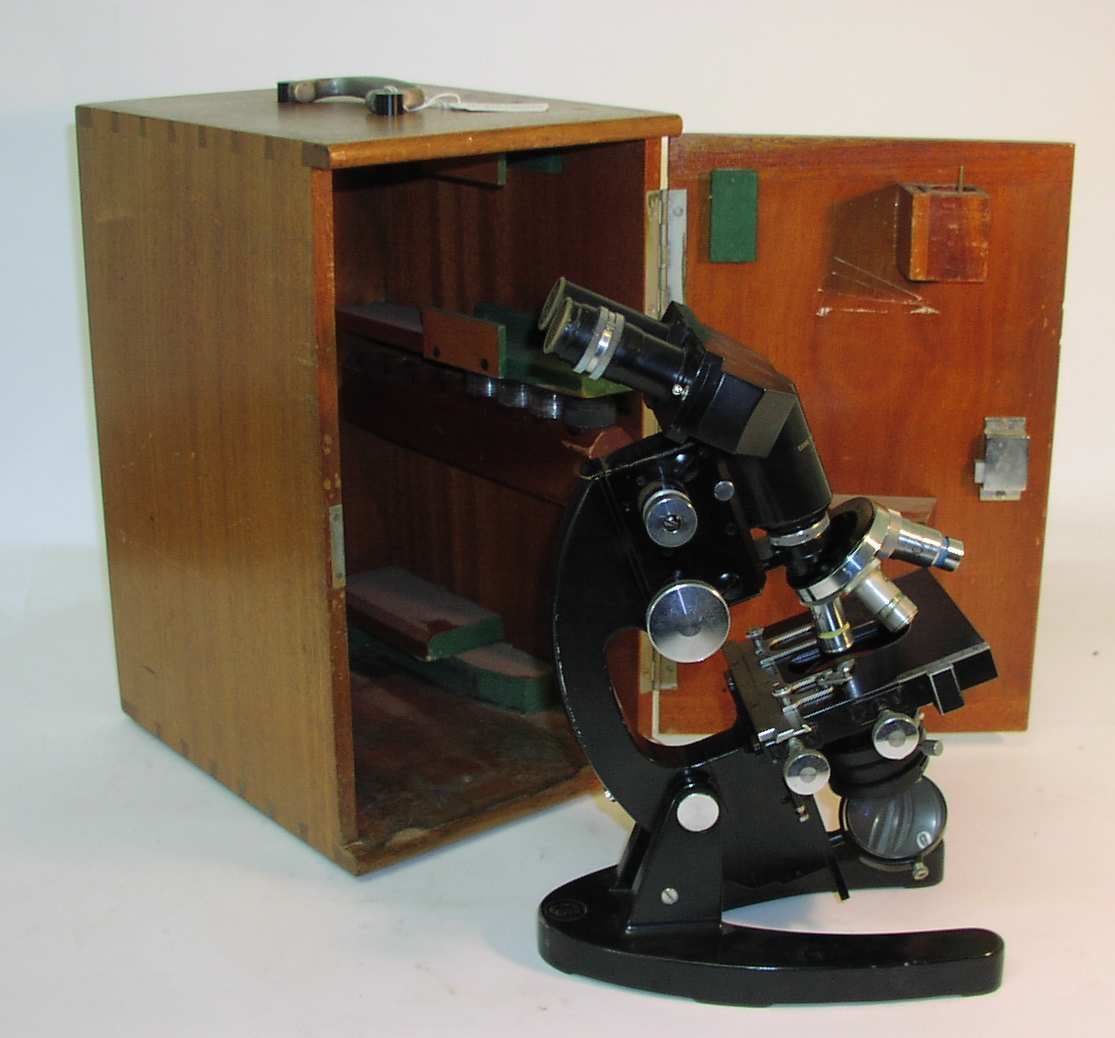 A 1930's binocular microscope by Cooke A - auctions & price archive