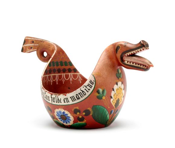 Bonhams : A Norwegian painted birch dragon-head kasa
