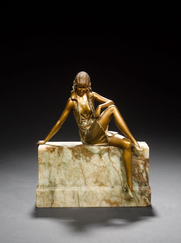Bonhams : Ferdinand Preiss 'Girl on Wall' a gilt, patinated bronze Art ...