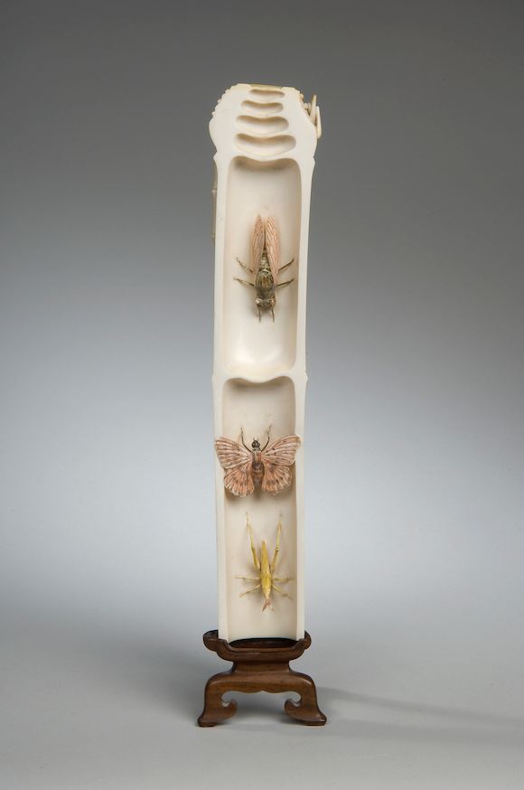 Bonhams : A 19th Century Chinese carved and stained ivory wrist rest