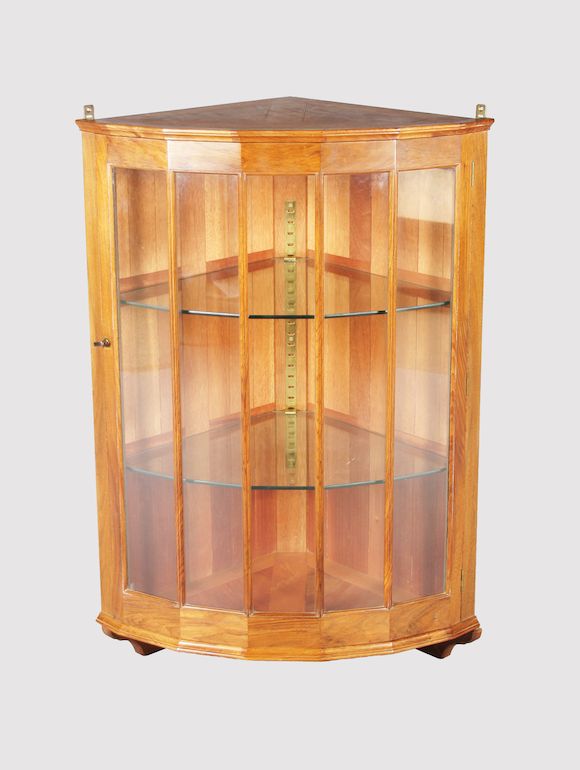 Bonhams : A Hugh Birkett walnut and mahogany hanging corner cupboard ...