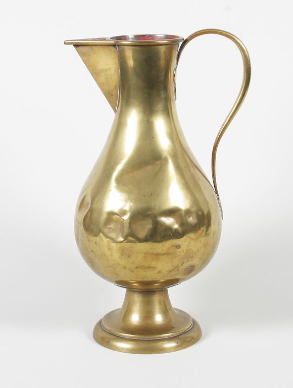 Bonhams : A brass baluster shaped church jug in the Pugin for Hardman style